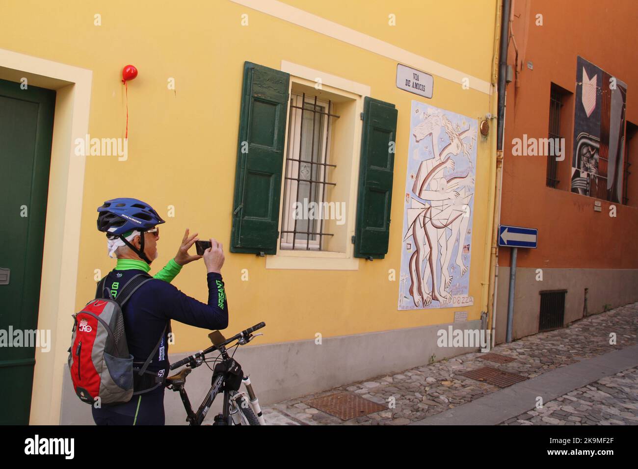 Dozza, Italy. Murals on the facade of historical buildings, created by ...