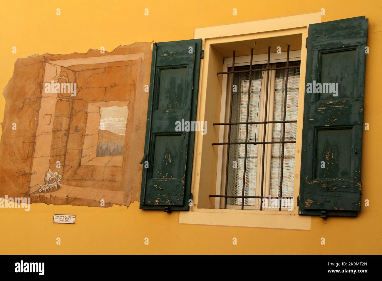 Dozza, Italy. Murals on the facade of historical buildings, created by ...