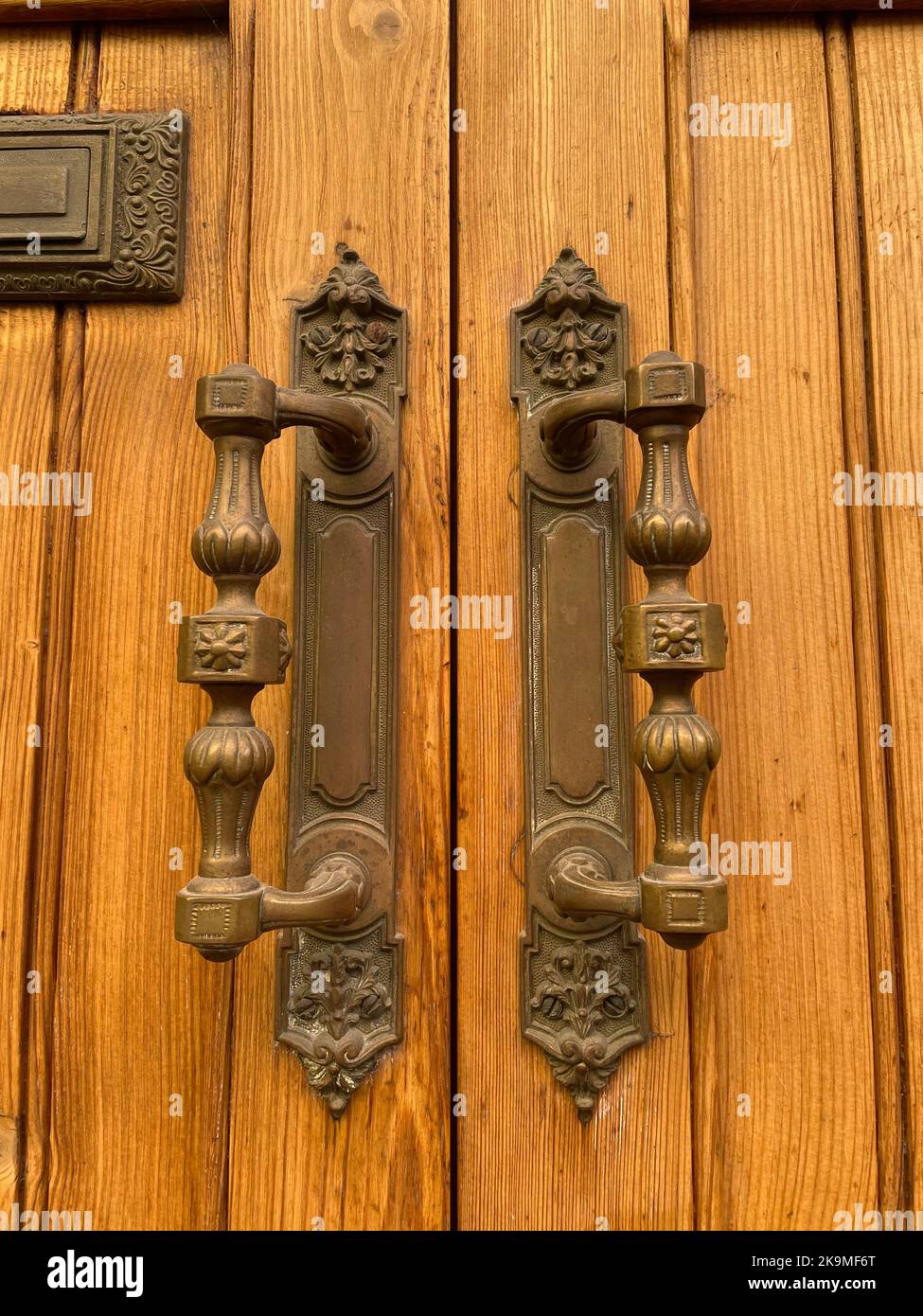 Beautiful ornated door handles at a private residence in Italy Stock ...