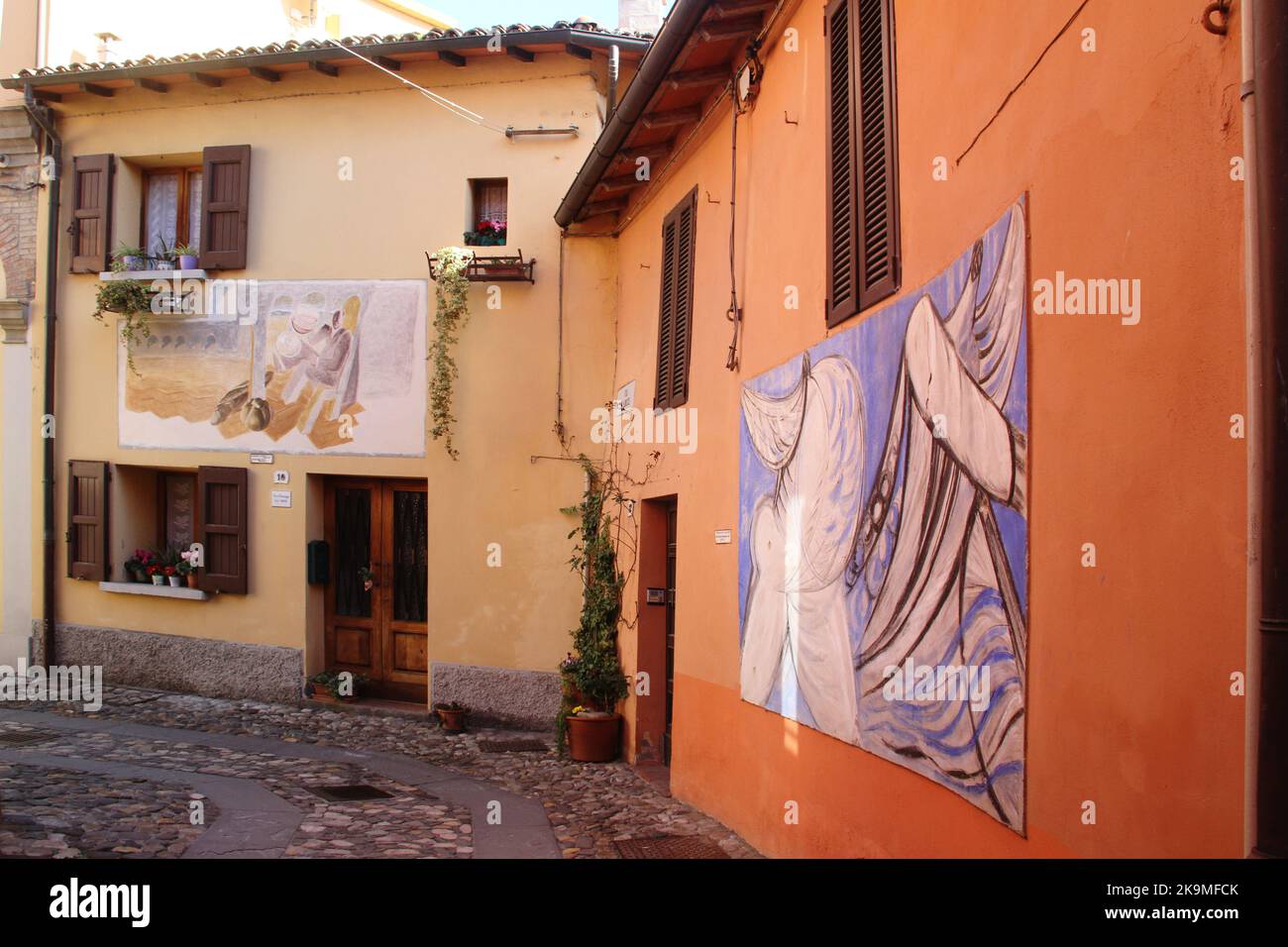 Dozza, Italy. Murals on the facade of historical buildings, created by ...