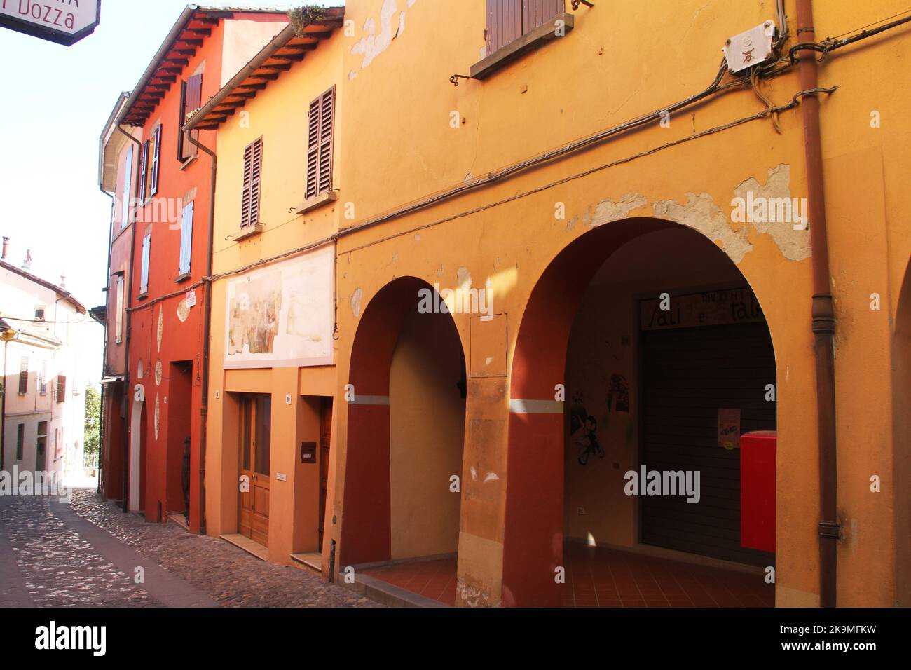Dozza, Italy. Historical buildings with porticoes along Via XX ...