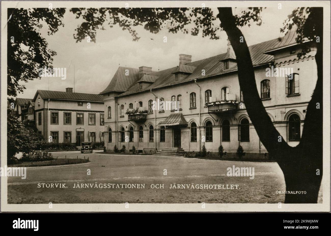 The railway hotel and the railway station in Storvik Stock Photo - Alamy