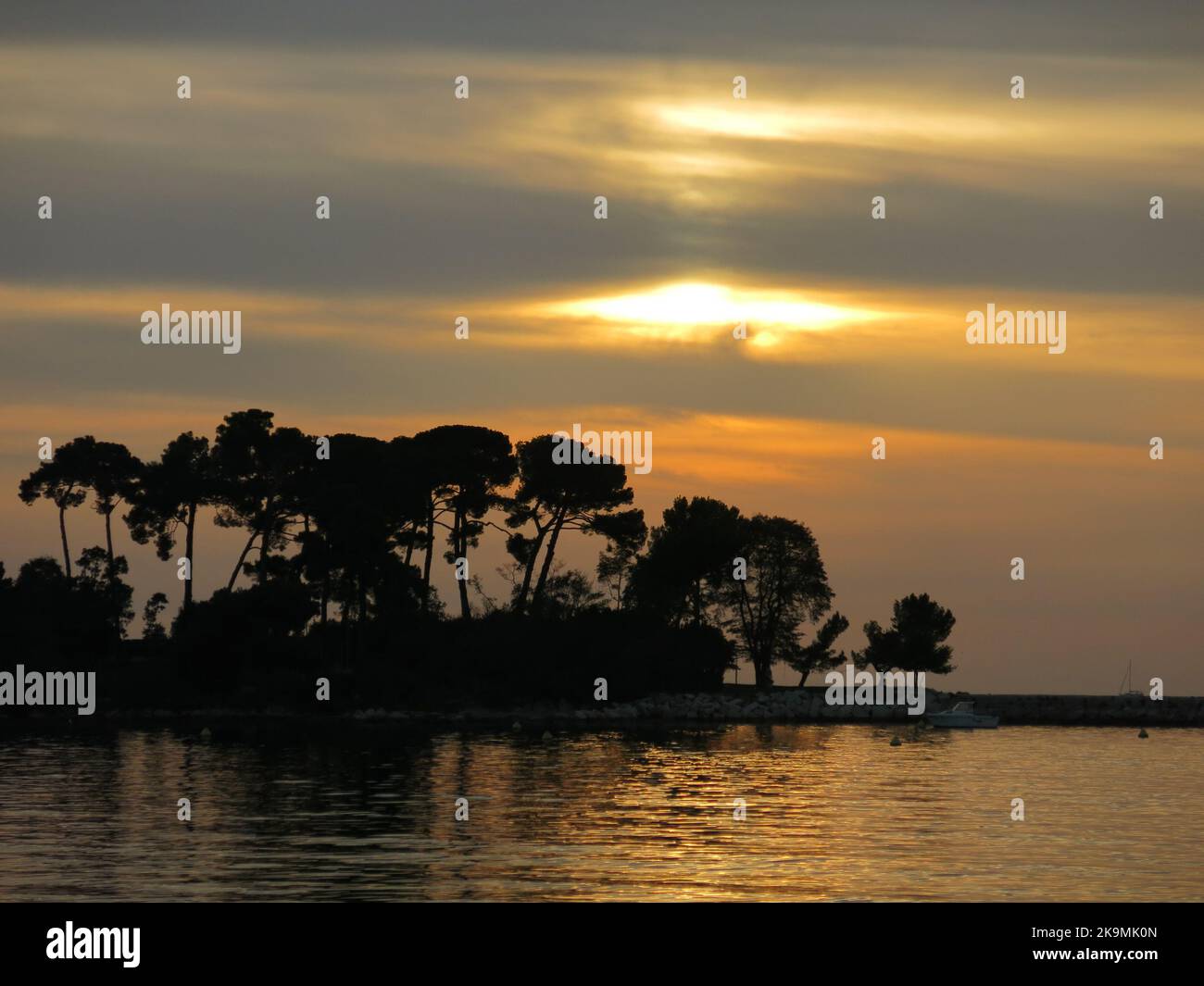 A beautiful sunset on the coast of the Istrian peninsula; a romantic ...