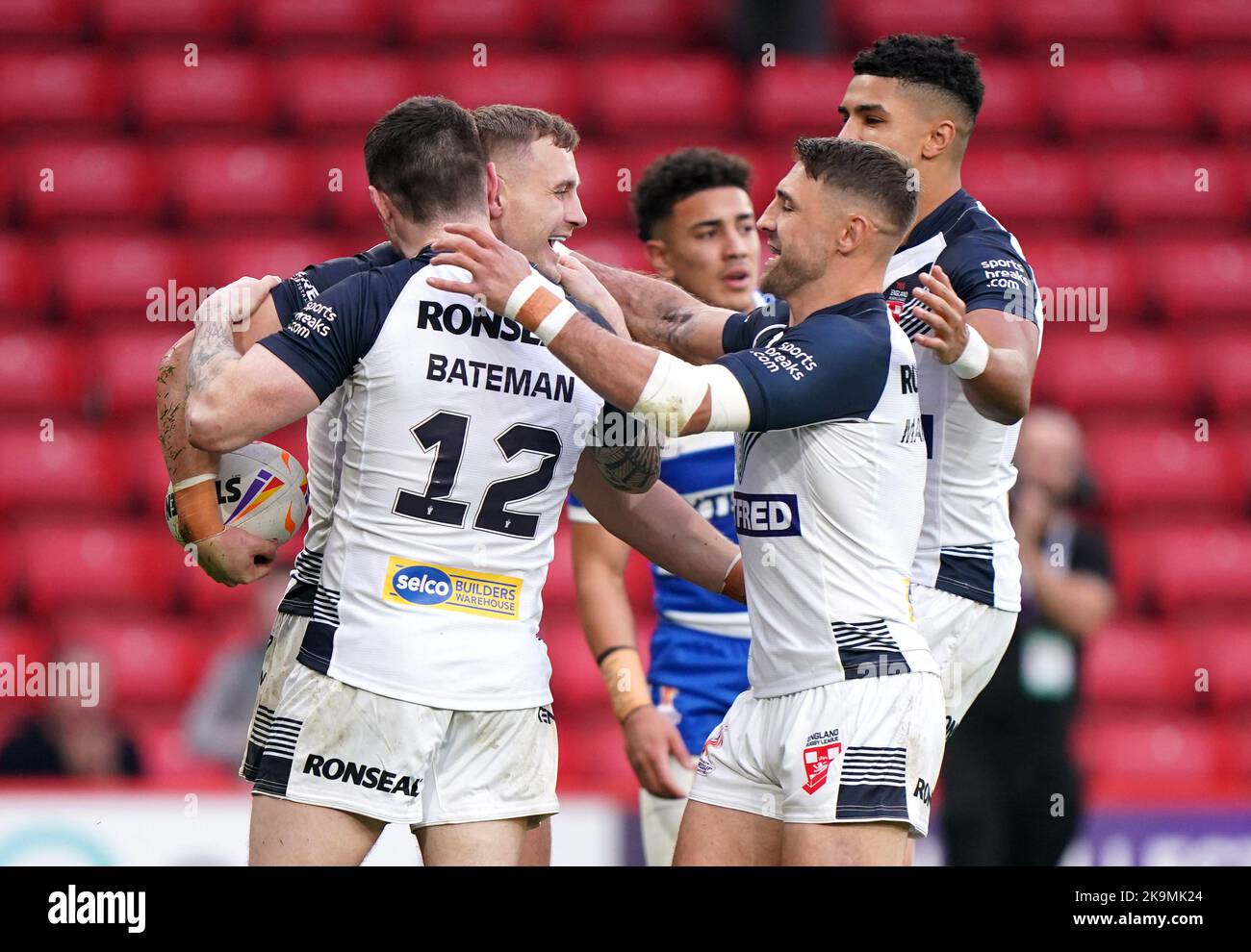 England's Matty Lees (second left) celebrates scoring their side's ...