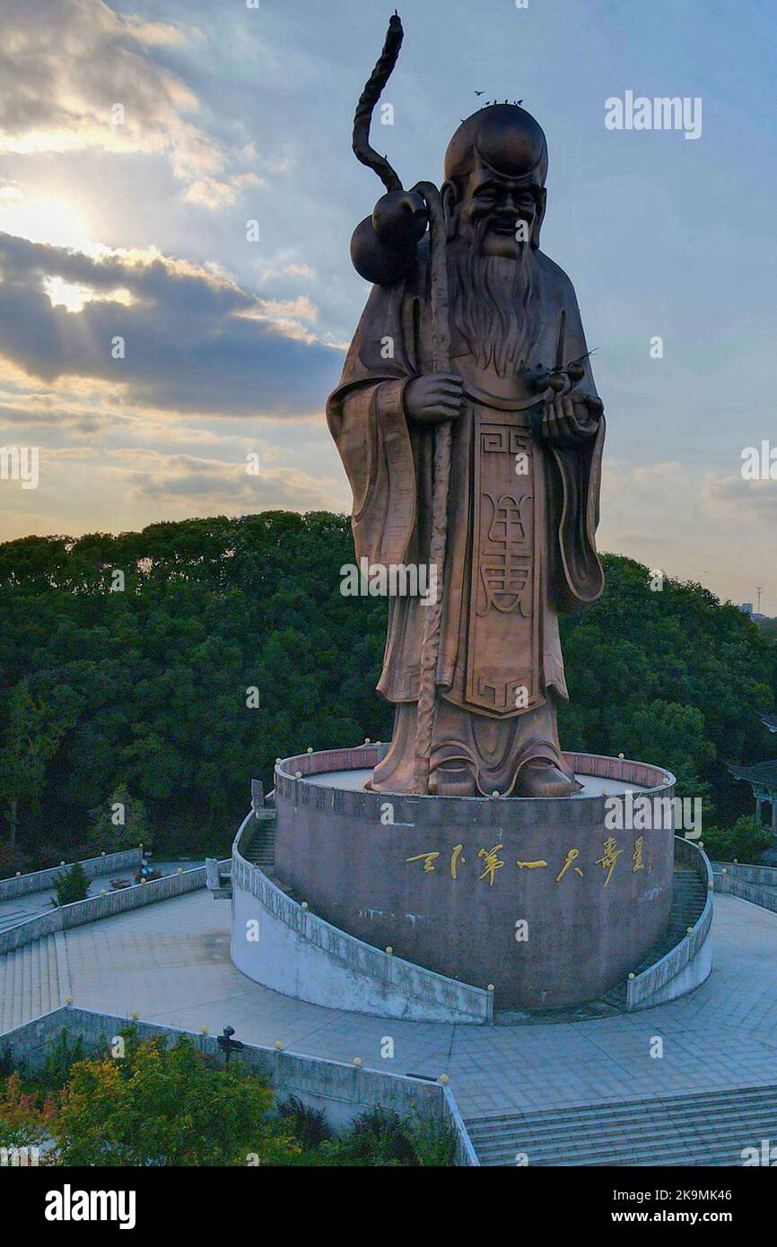 RUGAO, CHINA - OCTOBER 29, 2022 - A 49-meter-tall bronze statue of a ...