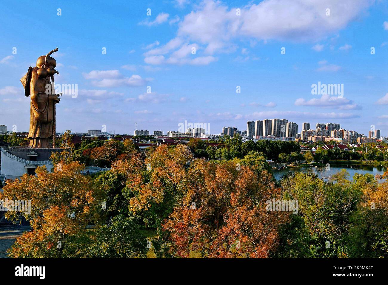 RUGAO, CHINA - OCTOBER 29, 2022 - A 49-meter-tall bronze statue of a ...