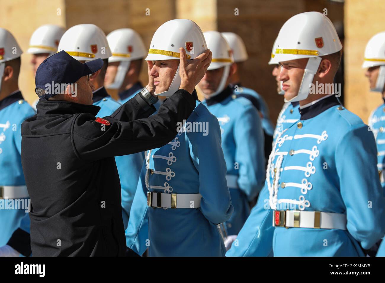 An officer inspects the soldiers before the ceremony at the mausoleum ...