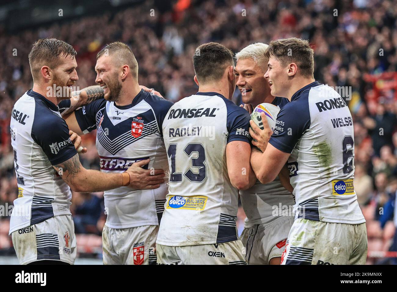 Ryan Hall of England celebrates his try with team mates during the ...