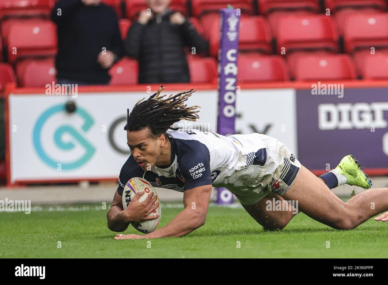 Dom Young of England goes over for his fourth try during the Rugby ...