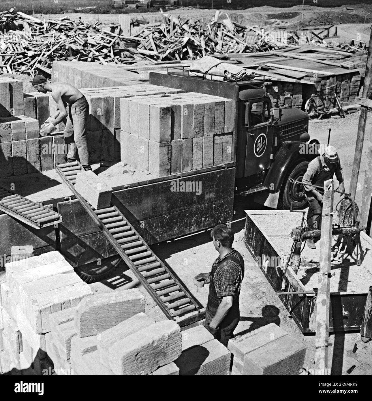 Loading of building materials. SL AB Transport Stock Photo - Alamy