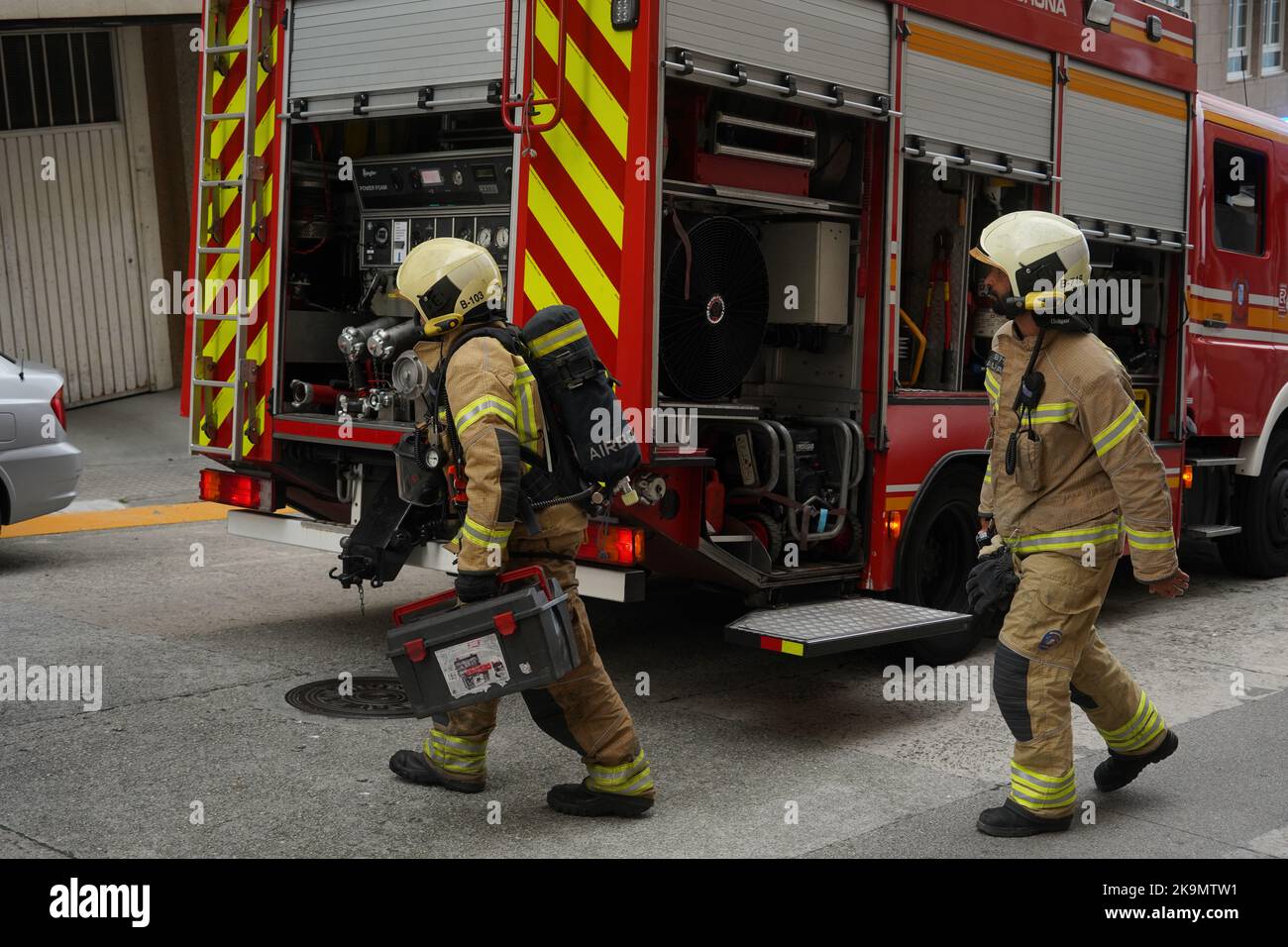 A Coruna, Spain Firefighters go by fire truck to put out a house fire ...