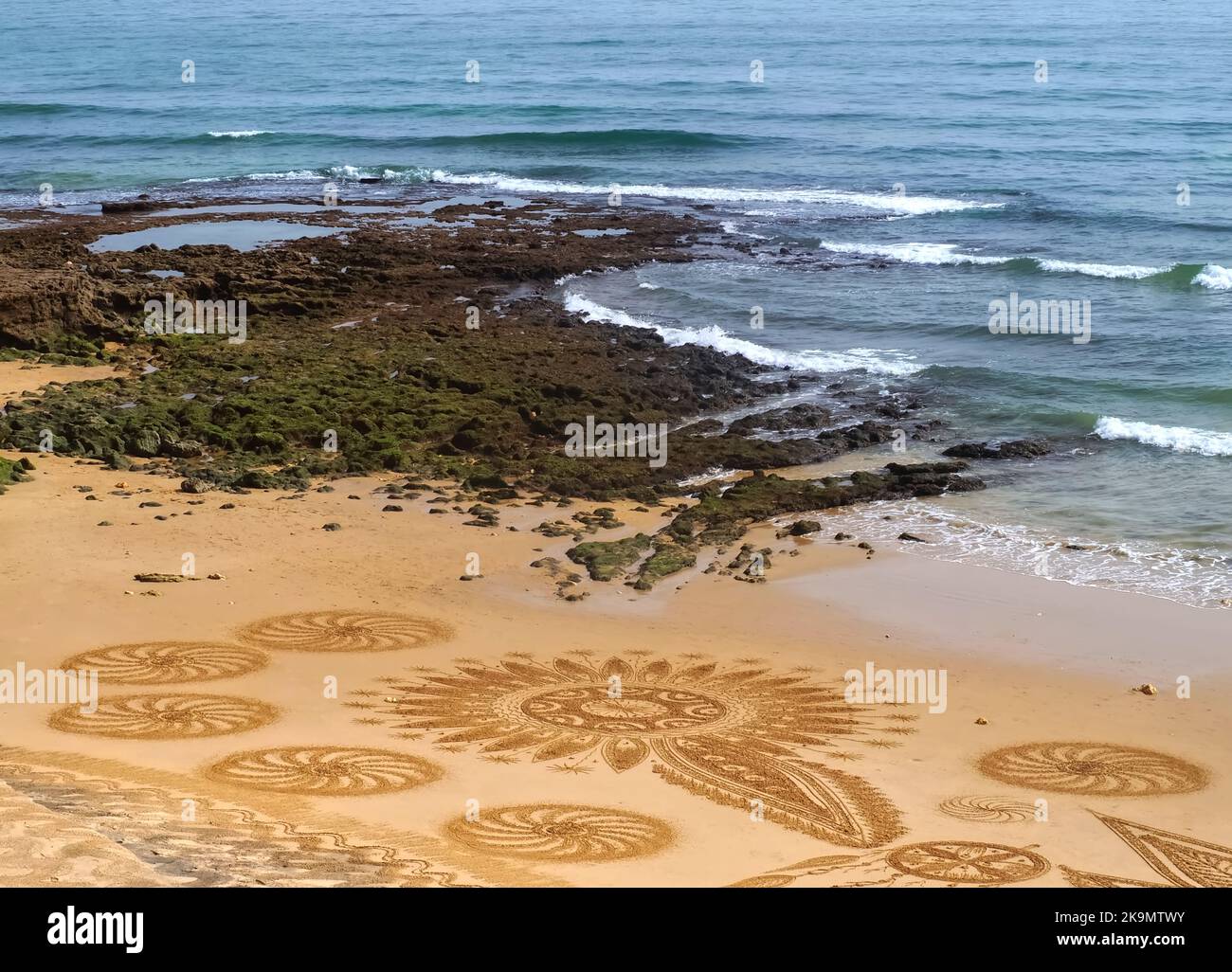 Beautiful beach sand mandala in Albufeira in Portugal Praia Maria Luisa ...
