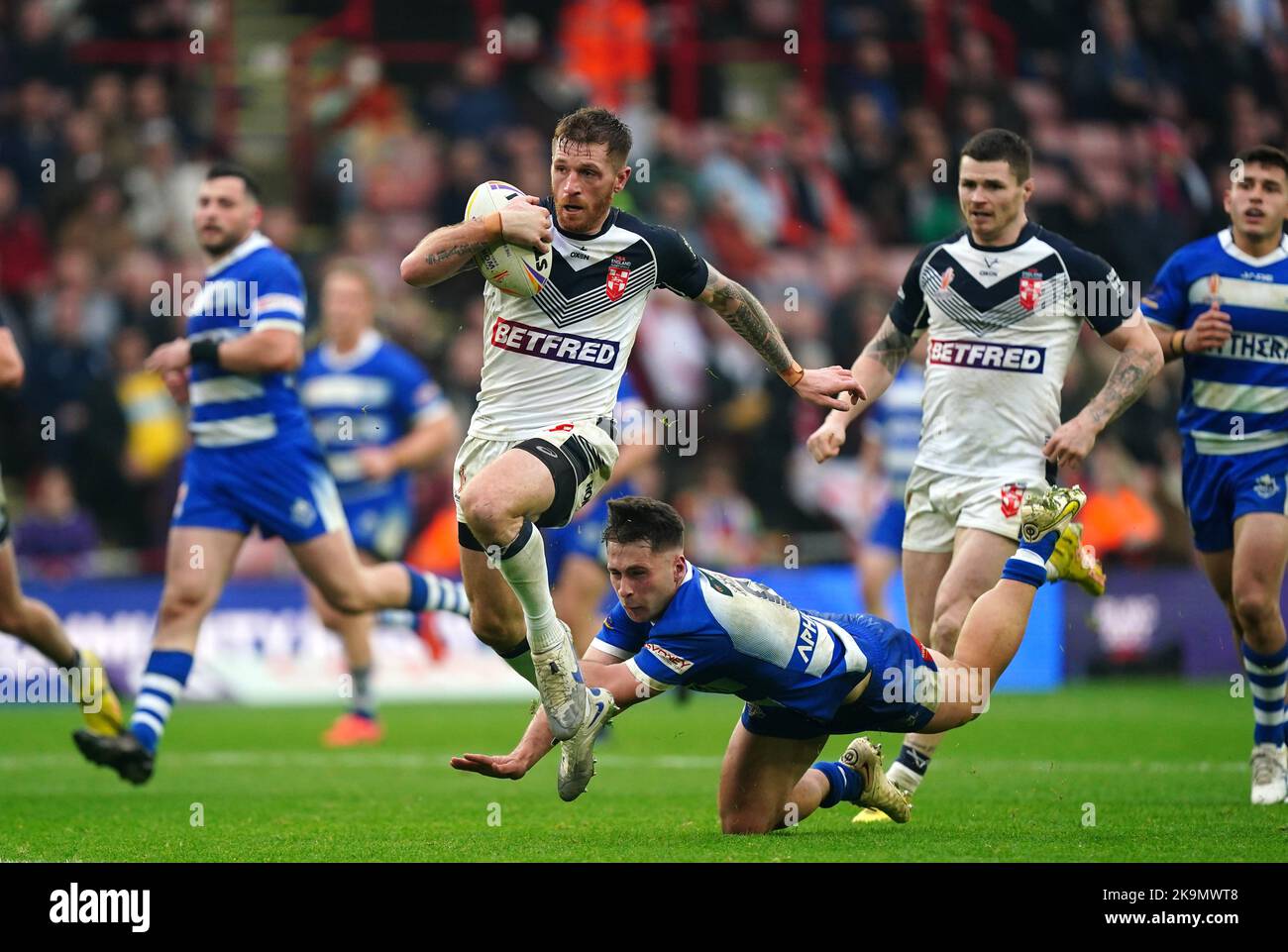 England's Marc Sneyd on the way to scoring their side's tenth try of ...