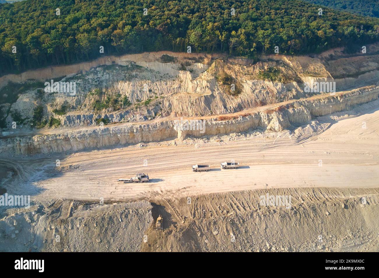 Aerial view of open pit mining of limestone materials for construction ...