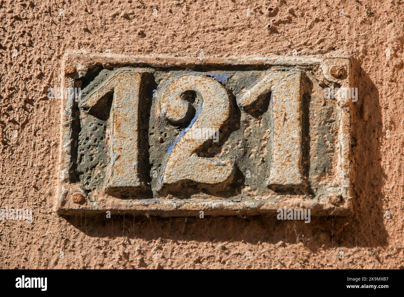 Old retro weathered cast iron plate with number 121 closeup Stock Photo ...