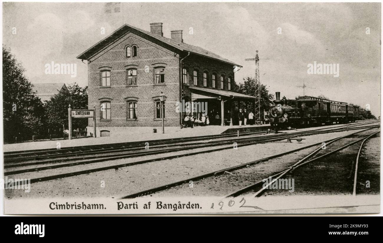 Simrishamn's yard and station house with steam train Stock Photo - Alamy