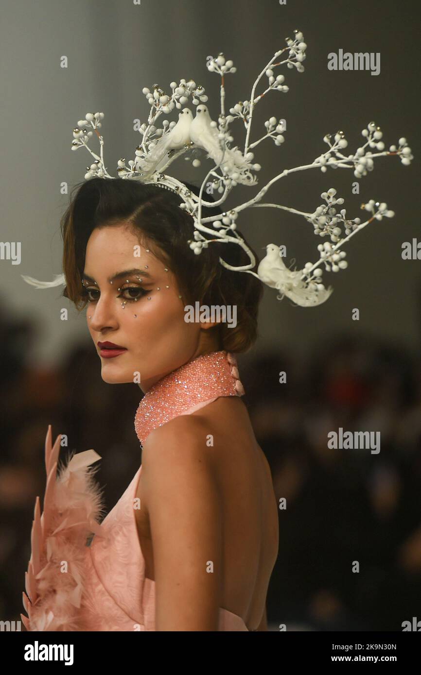 Jakarta, Indonesia. 29th Oct, 2022. A model presents a creation at a show entitled "The Kingdom ...