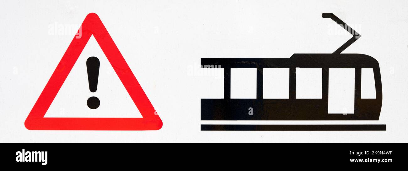 Close-up of white danger traffic hint road sign street red triangle ...