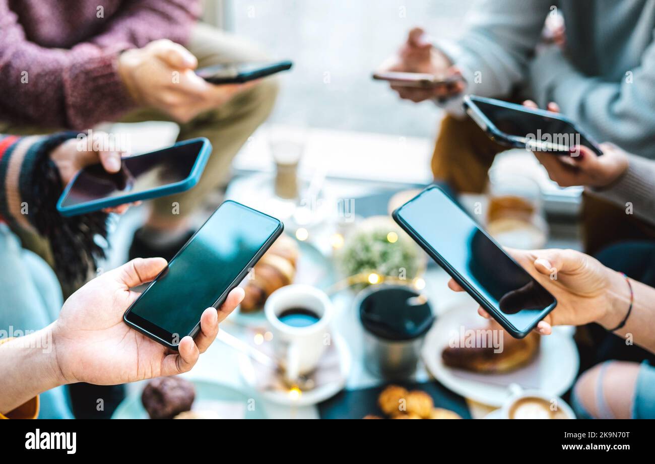 Friends group having fun using mobile smart phone chat - Detail of ...