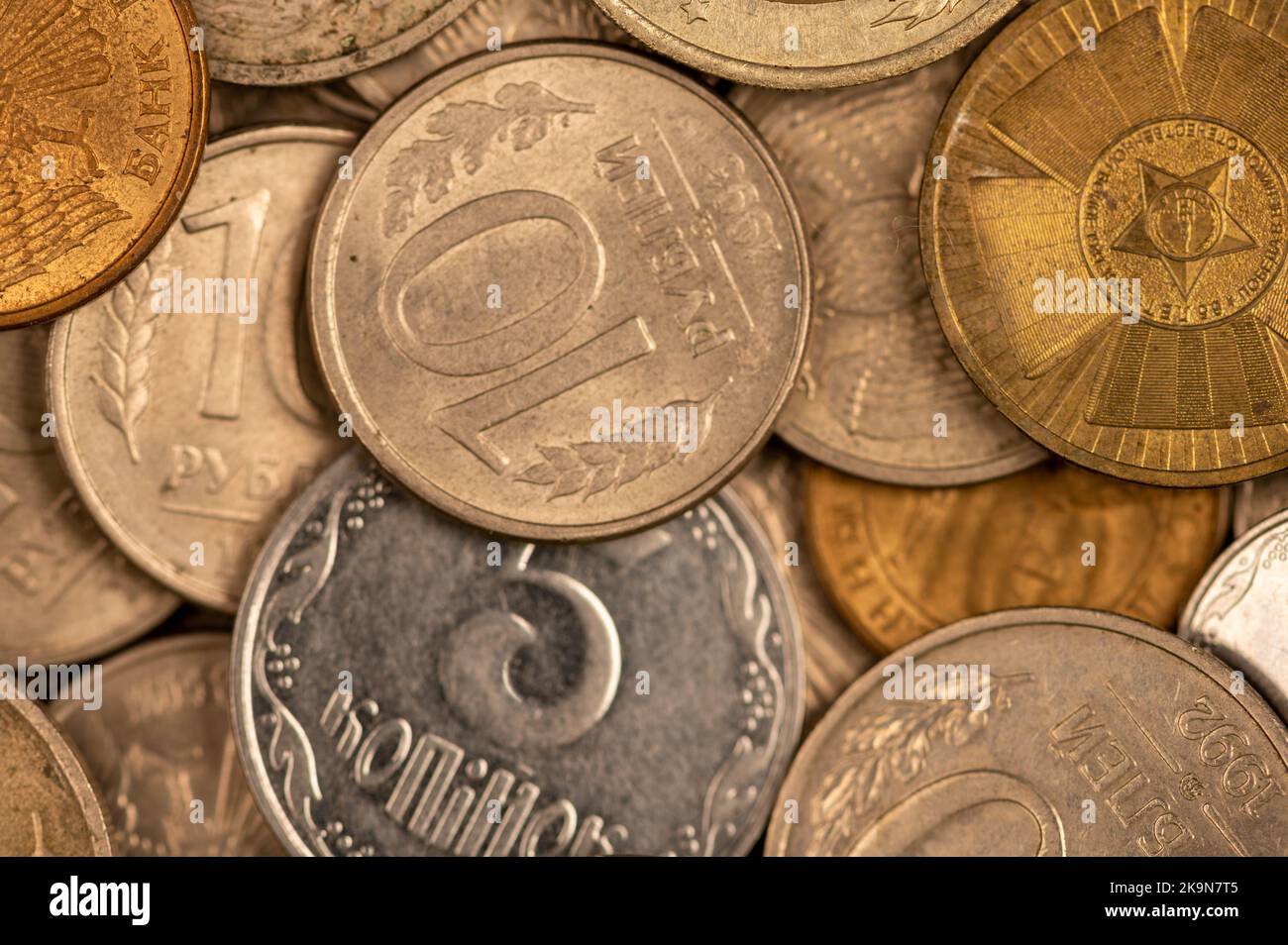 Old coins of the USSR in bulk on a flat surface, background image ...