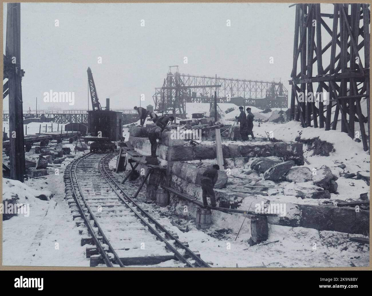 Rebuilding of the ore shipping bridge on Svartön next to Luleå. Winter ...