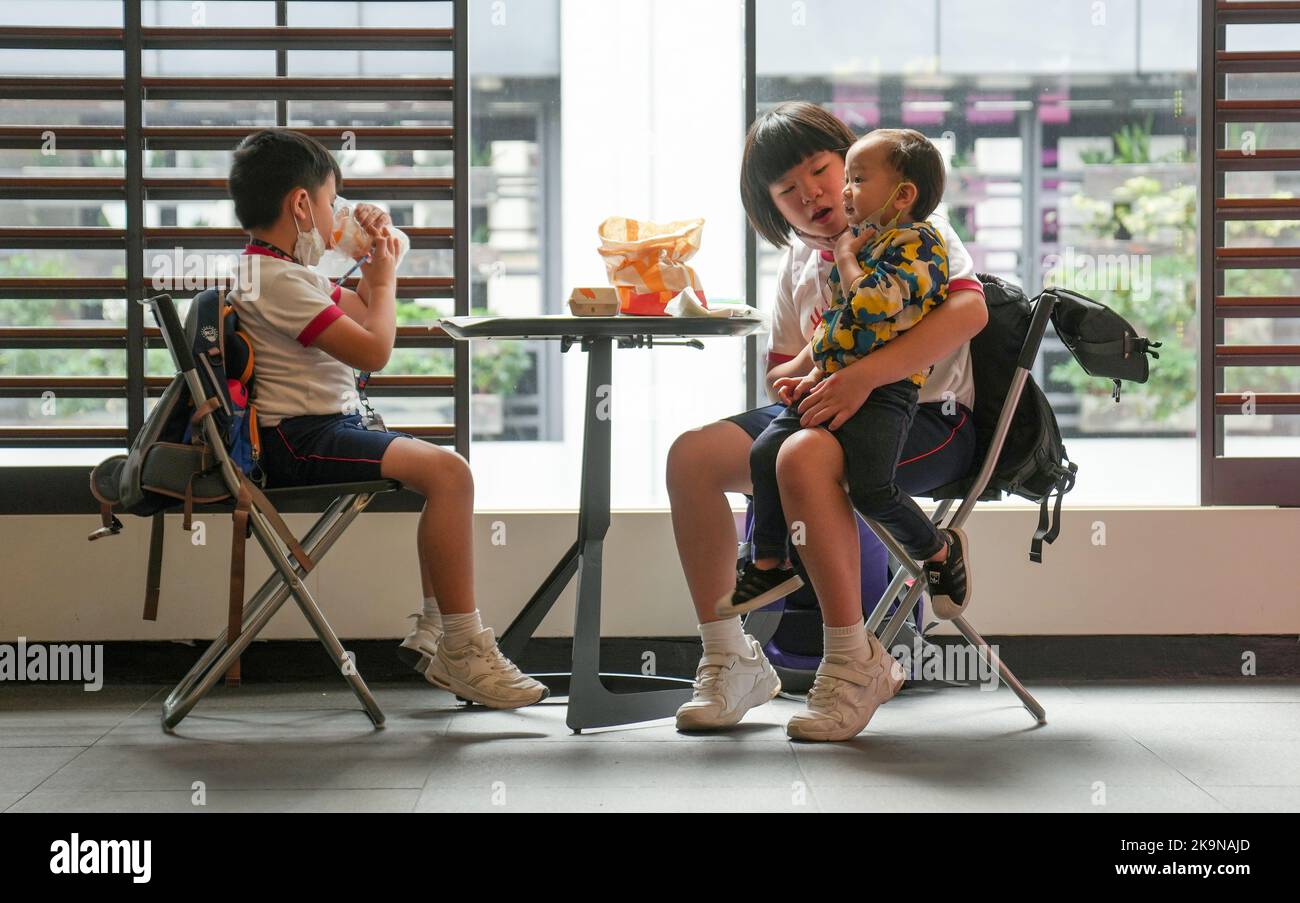 Children having meal after school at The 7 Mallory Street in Wan Chai ...
