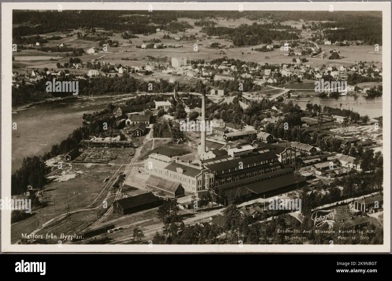 Aerial photo over Matfors with Ljungan and factory in picture Stock ...