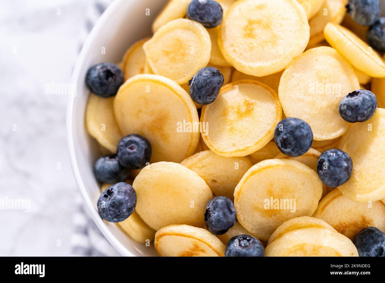 Mini pancake cereal Stock Photo - Alamy