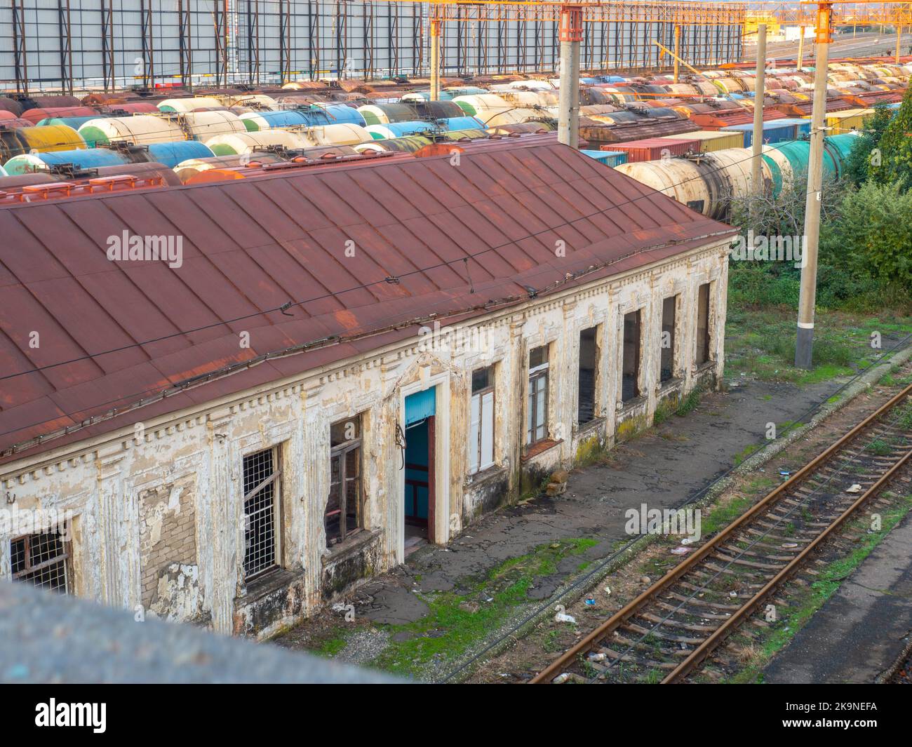 Old abandoned station building. Creepy places. Sunset at the train ...