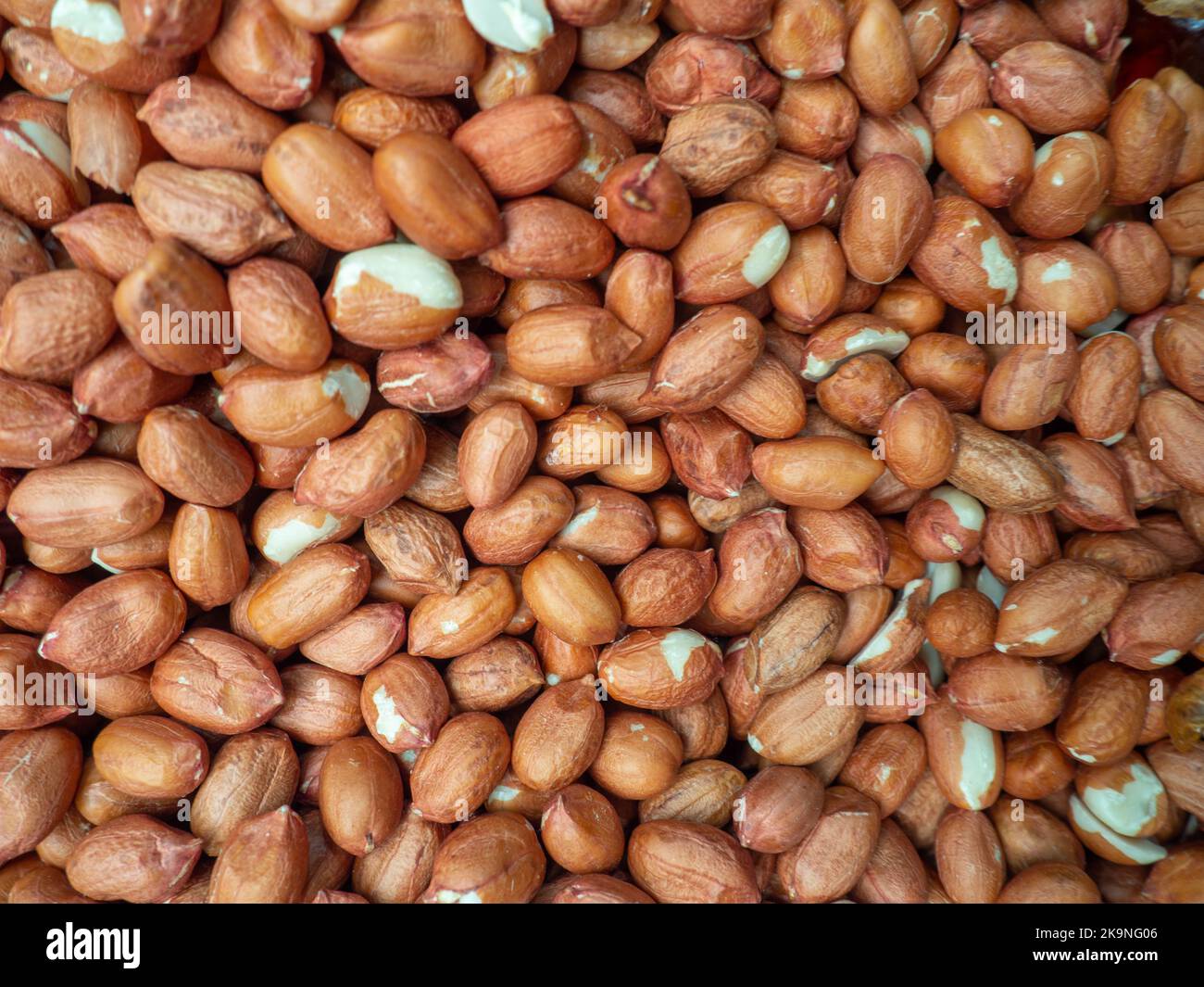 Lots of peanuts. Background from peanut without shell. Snack on the ...