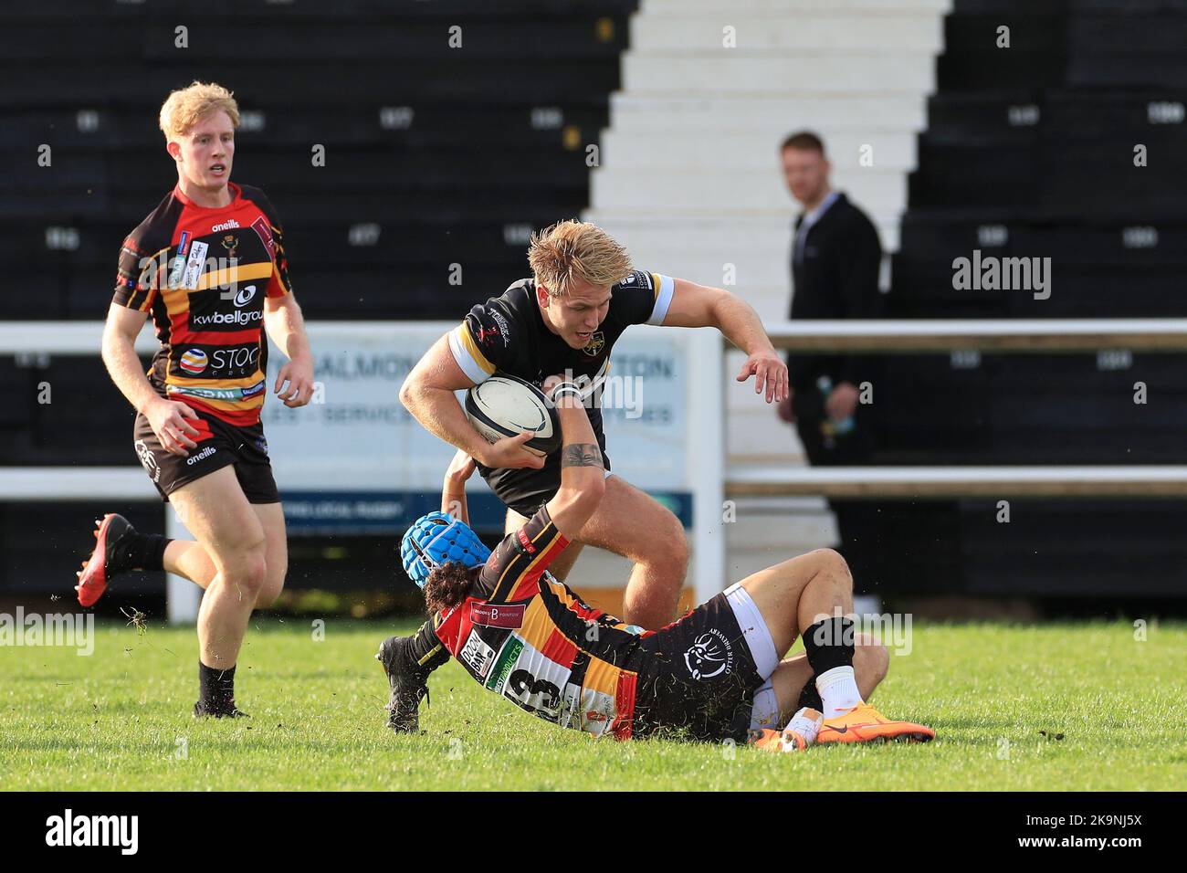 Charlie Crawley of Esher Rugby tackled by Morgan Adderly-Jones of ...