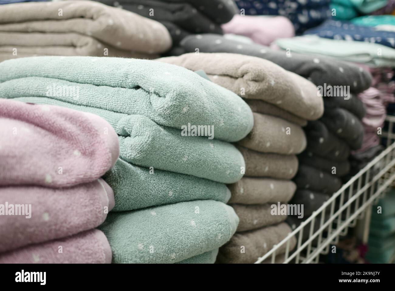 Close up of stack of shower towel on table Stock Photo - Alamy