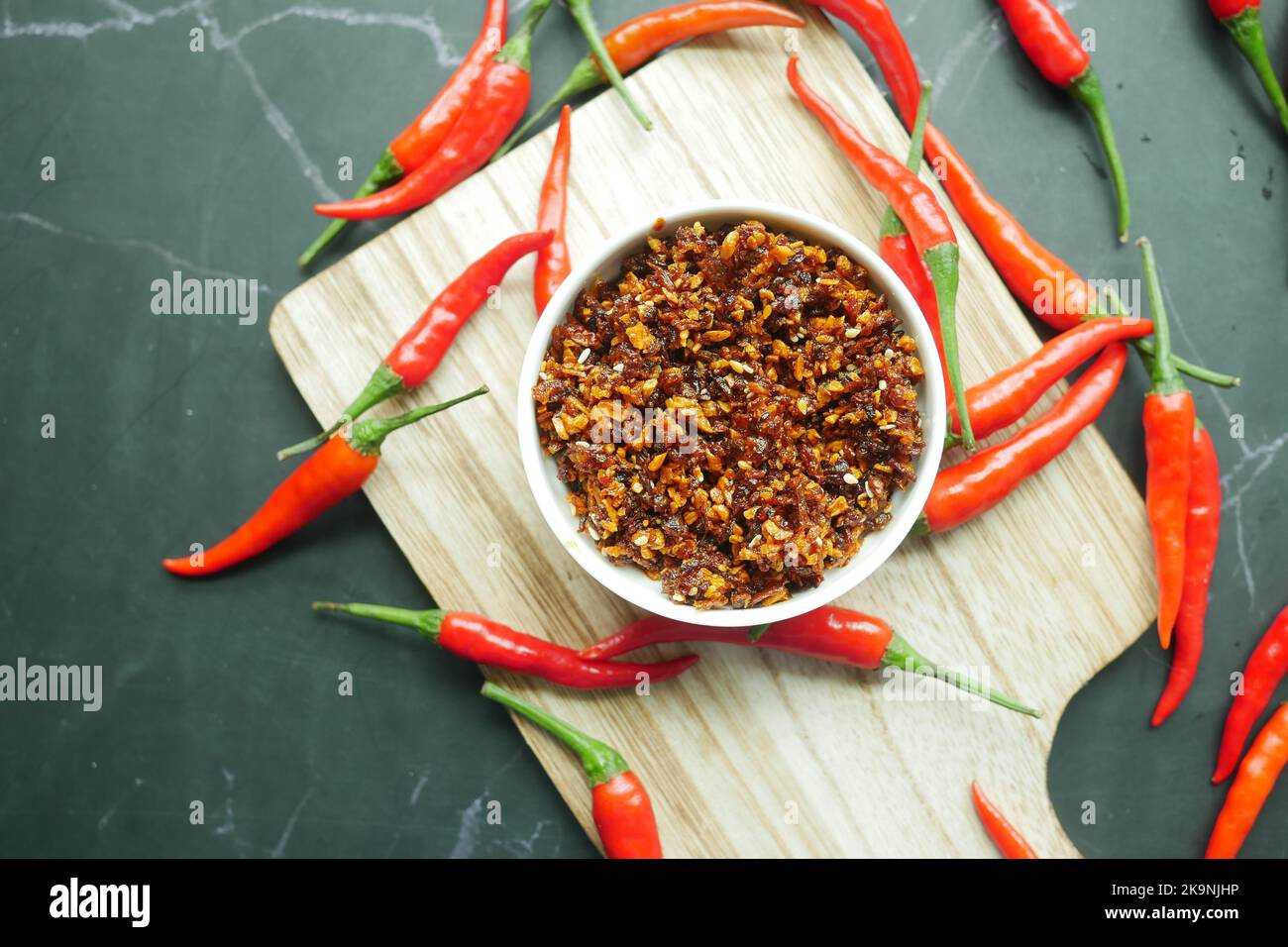 chili and garlic flakes in a container Stock Photo - Alamy