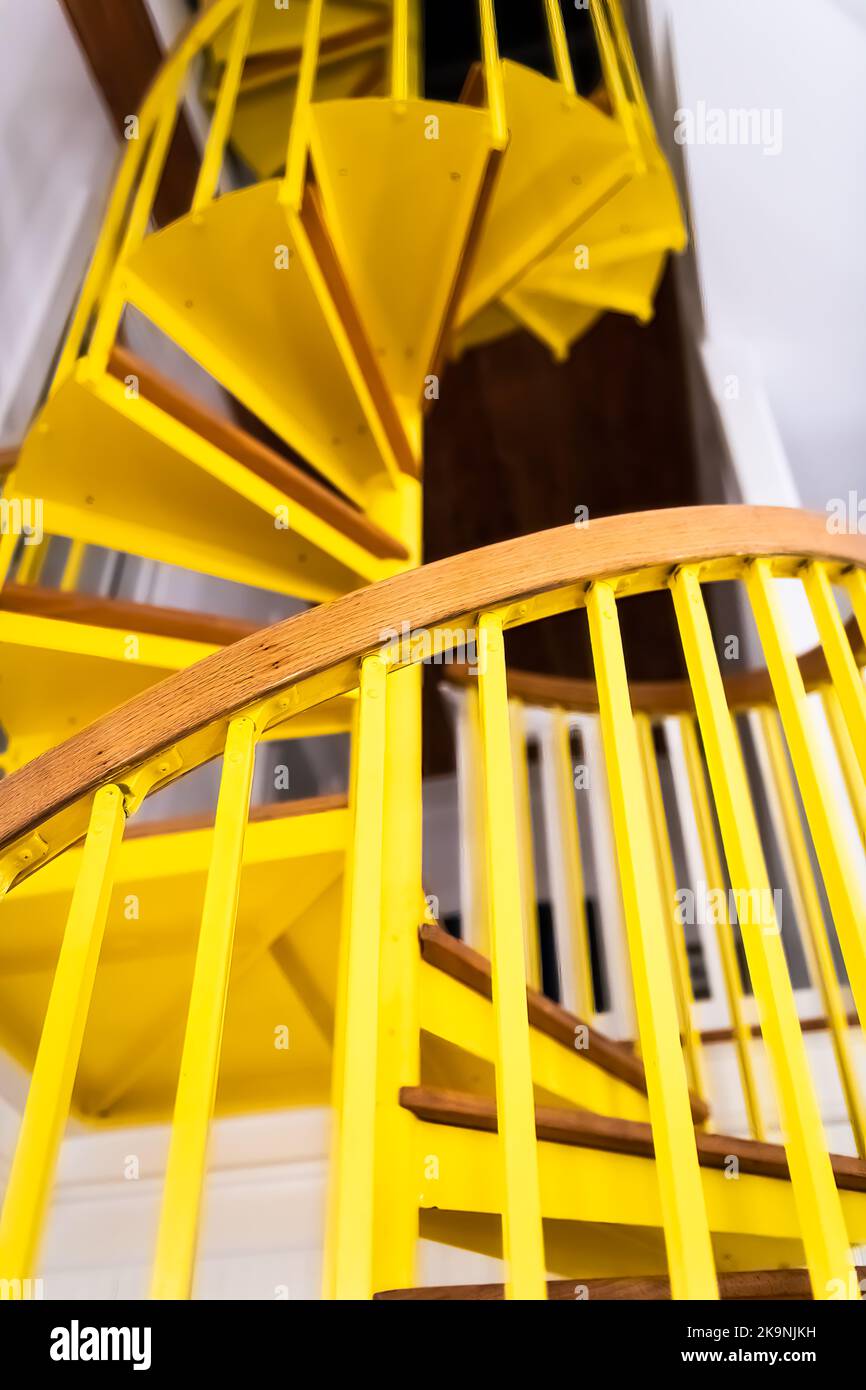 Below looking up perspective view of old vintage staircase in home ...