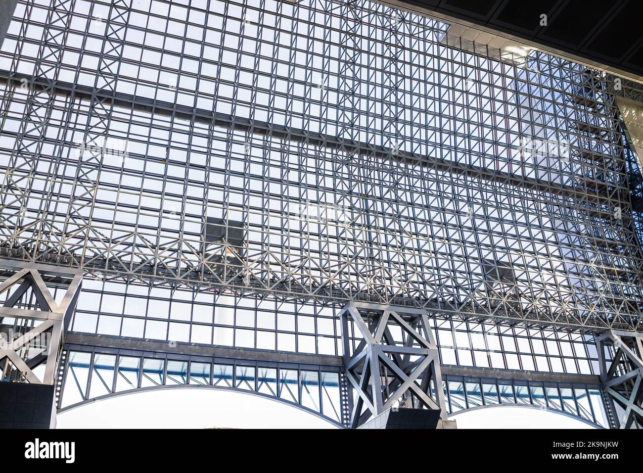 Futuristic train station steel frame wall with glass by entrance in ...