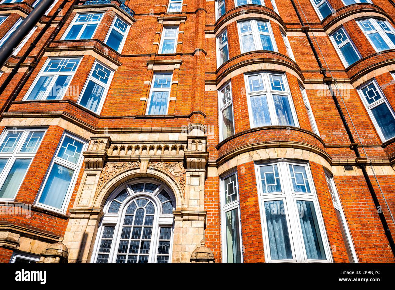 Residential apartment flats house building entrance in Gothic revival ...