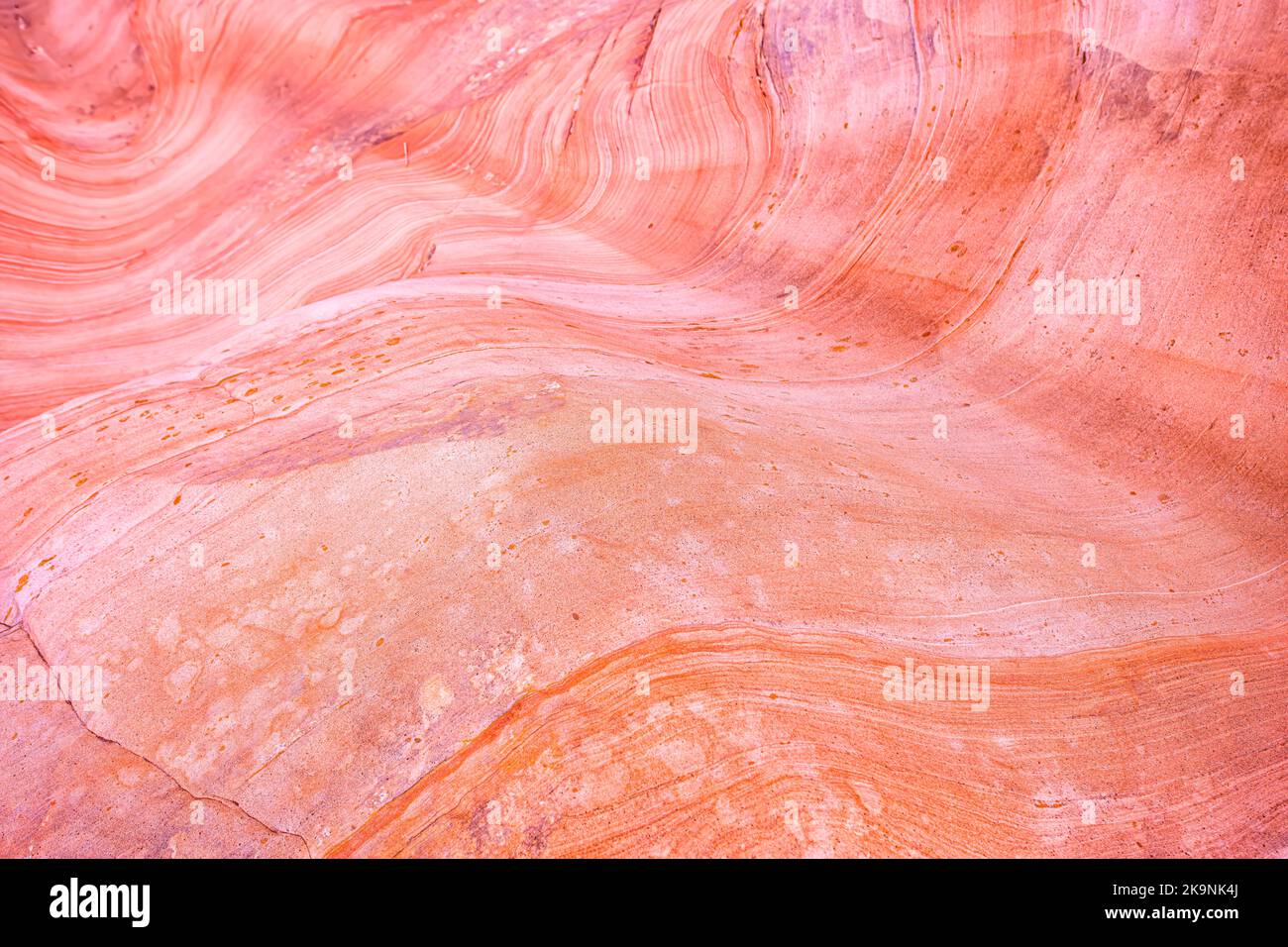 Macro closeup abstract red pink colorful sandstone rock formation ...