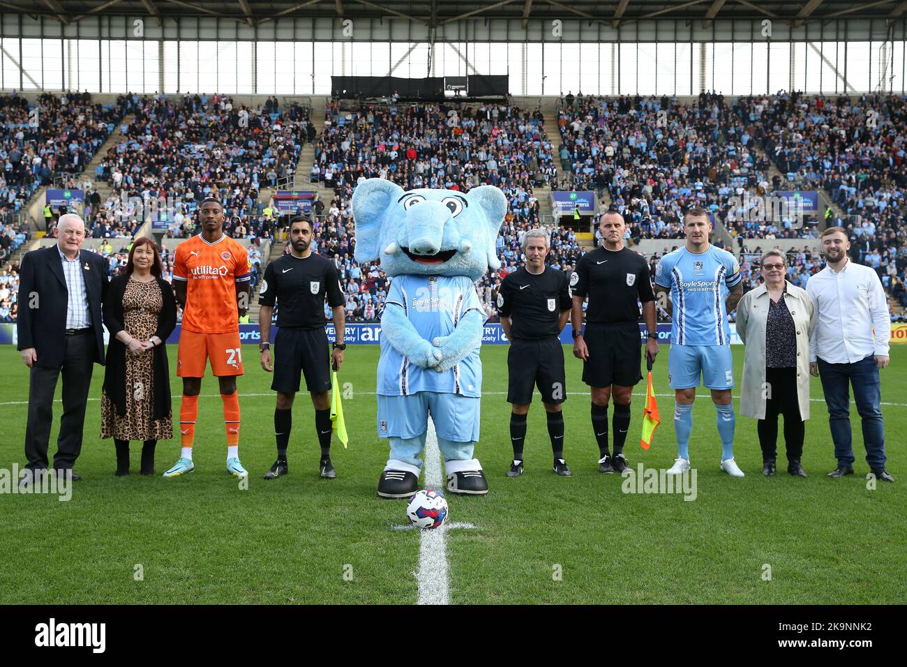 Match day sponsors pose with the team captains, match officials and the ...