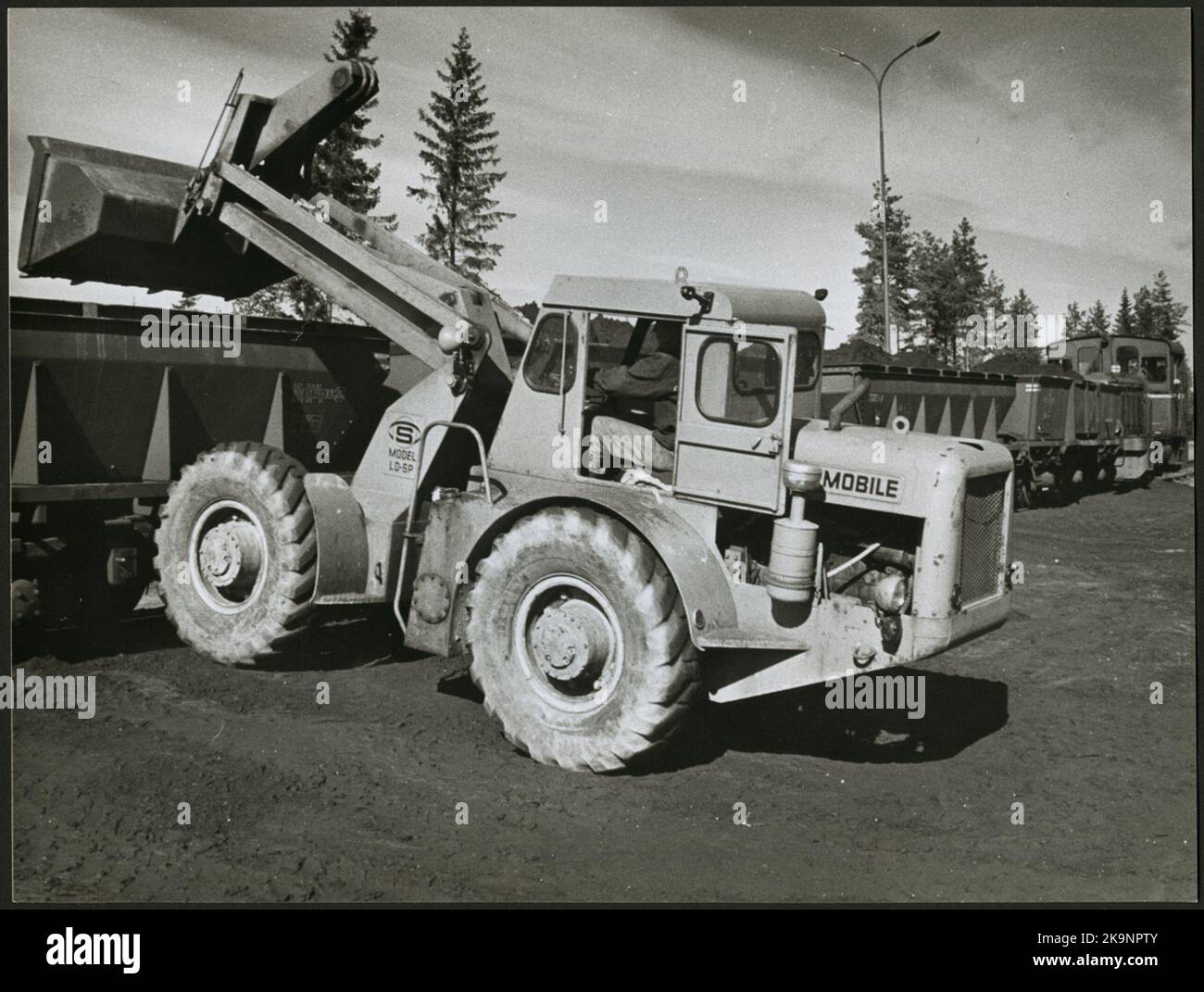 Loading of ore trains in Stråssa Stock Photo - Alamy