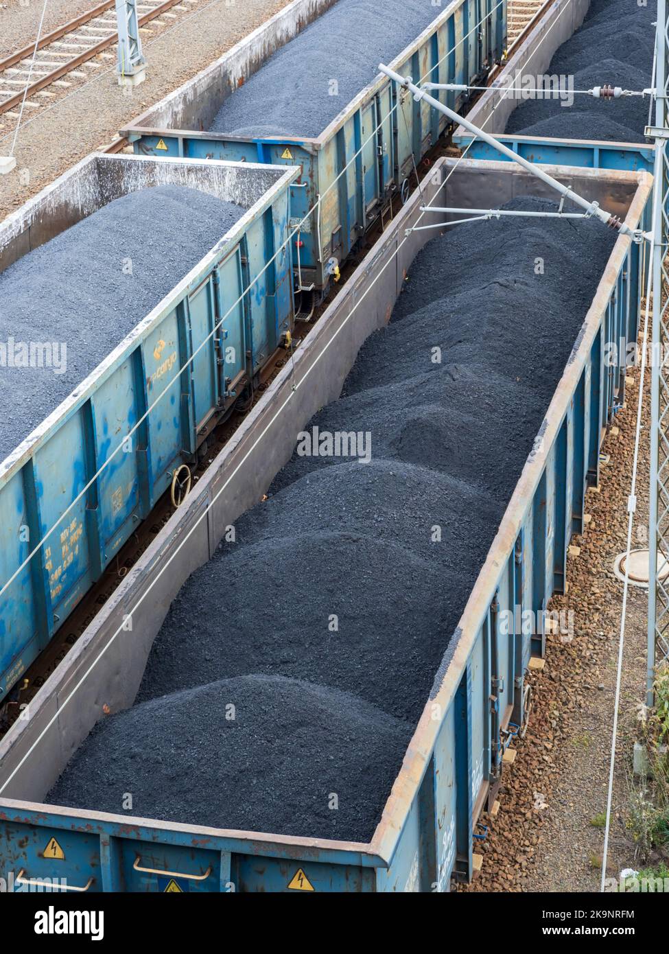 Poland, Warsaw - Railway carriages filled with coal. Transport of coal ...