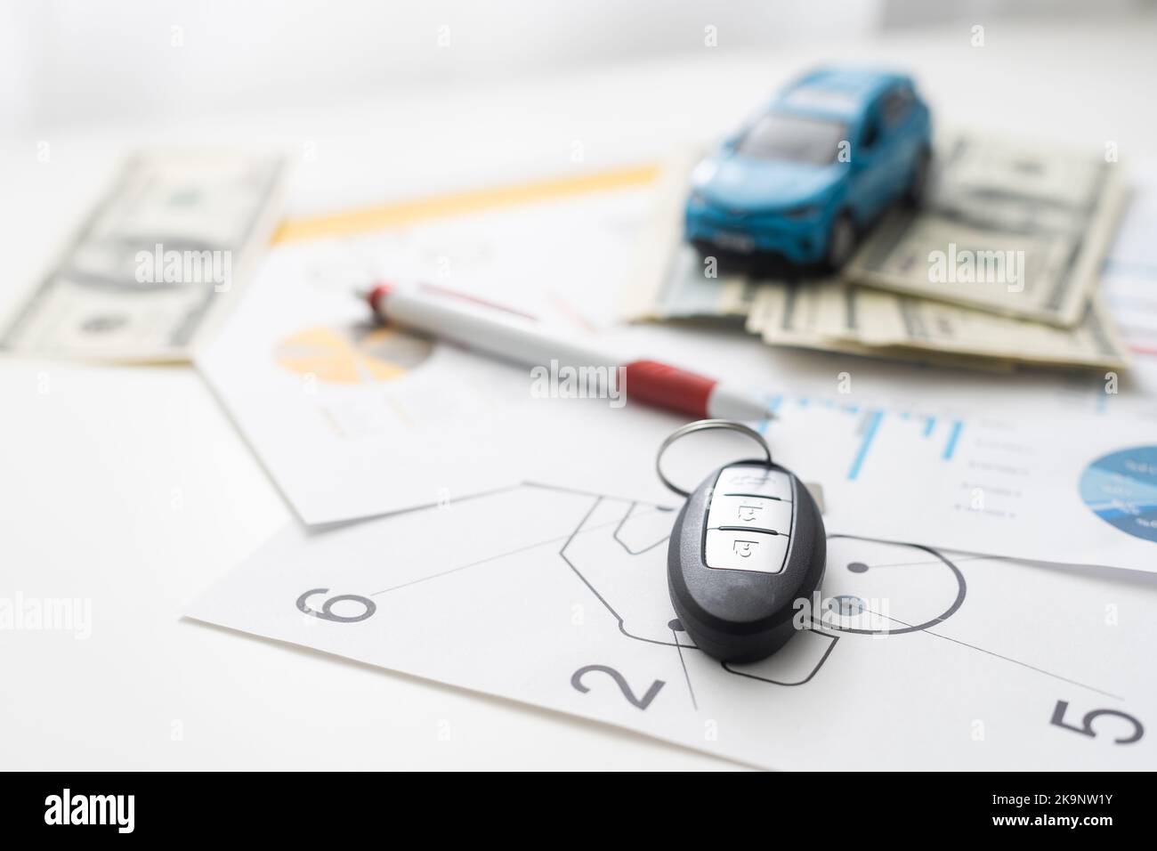 small car model and blueprint sheets Stock Photo - Alamy