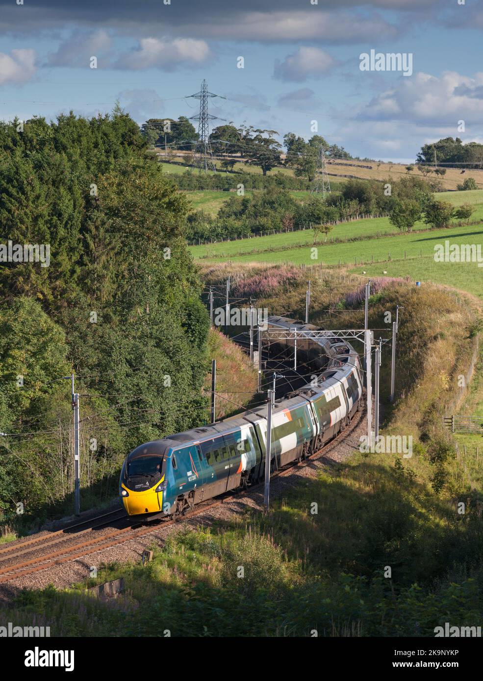 First Trenitalia Avanti West Coast Alstom Pendolino train 390042 tilting as it rounds a curve on ...