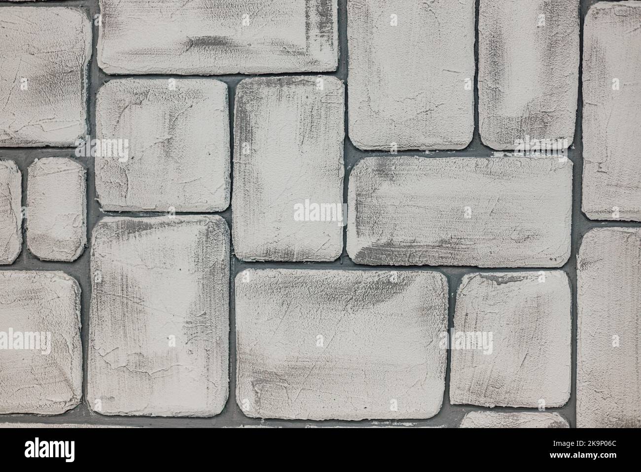 Grey brick wall. Large brick on the wall Stock Photo - Alamy