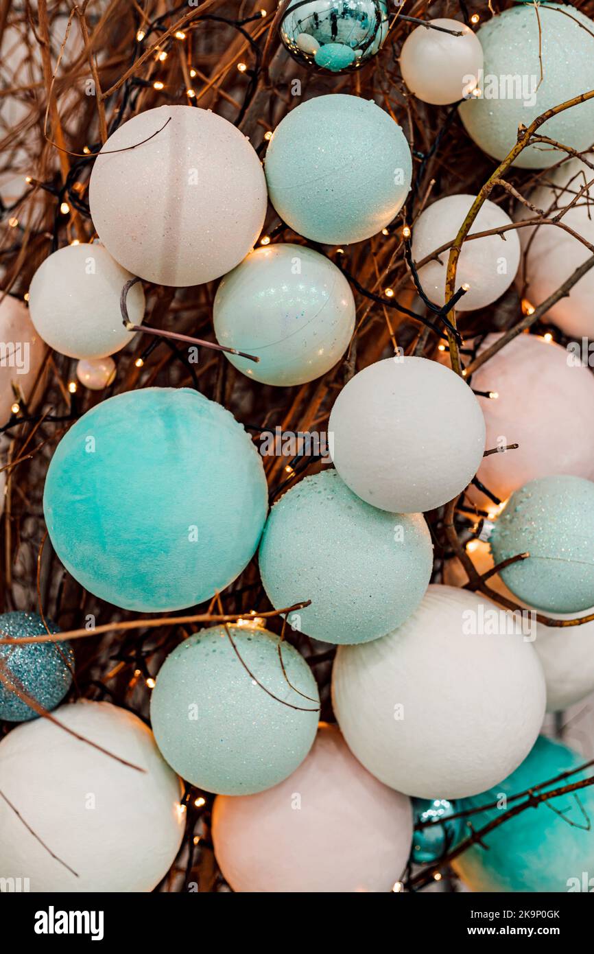 Blue and pink Christmas balls and Christmas lights Stock Photo - Alamy