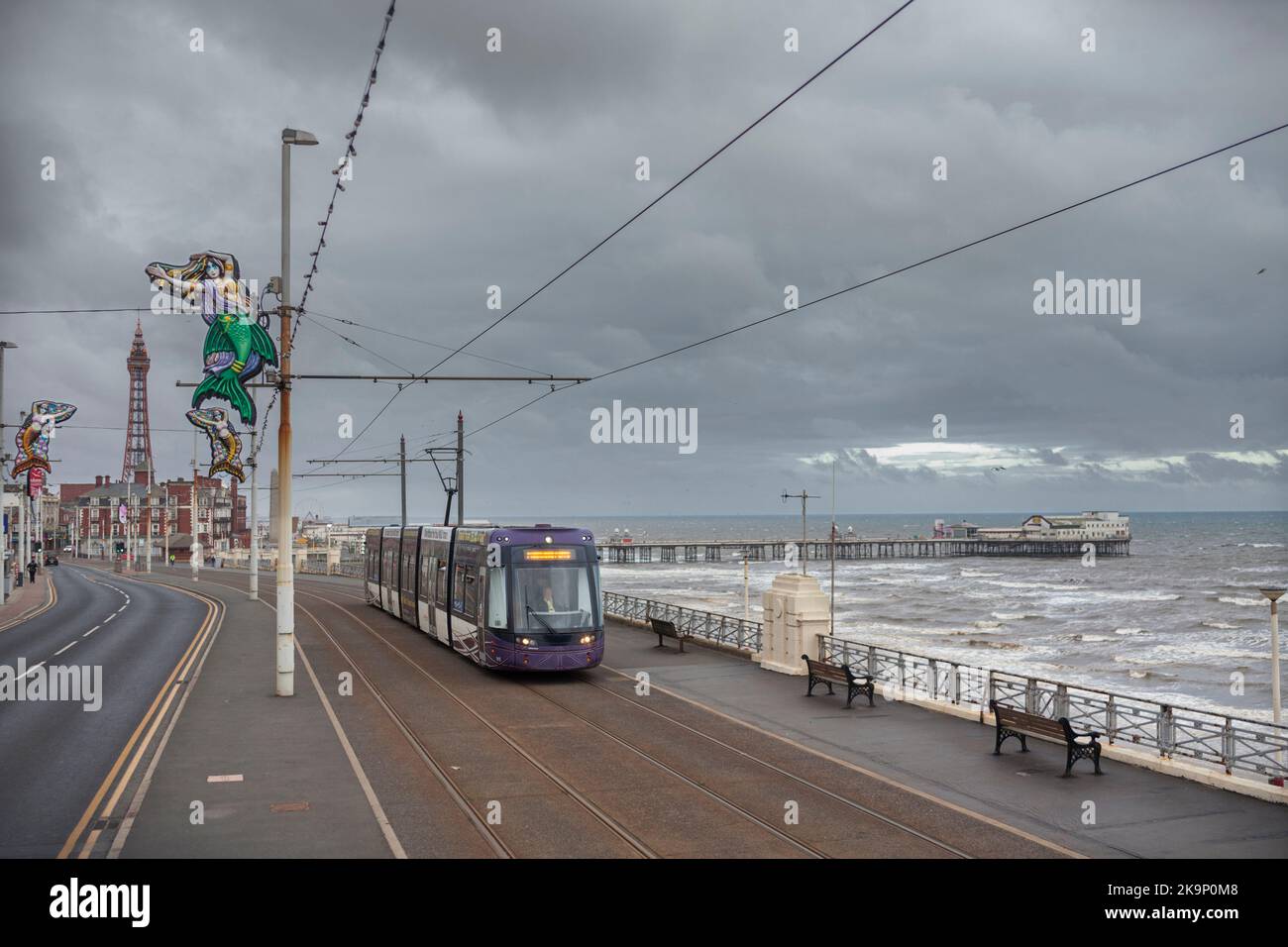 Passing Blackpool Pleasant Street with Blackpool tower and north pier ...