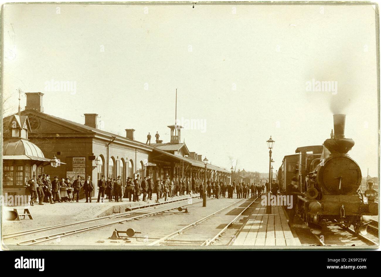 Nässjö station in 1898 by train and travelers. Public collection on the ...