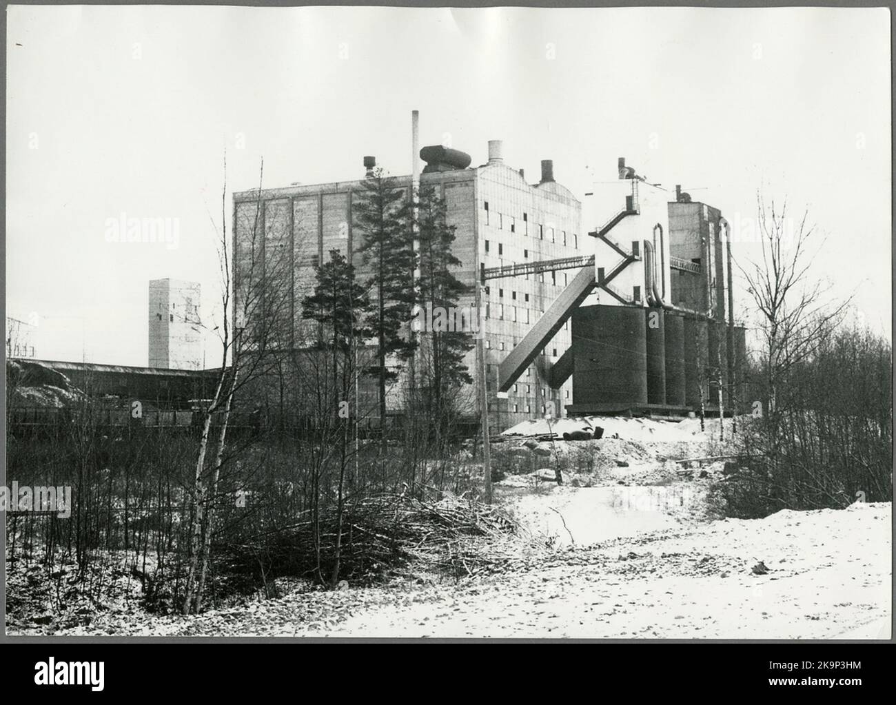 Factory building Iron ore pellet production in winter Stock Photo - Alamy