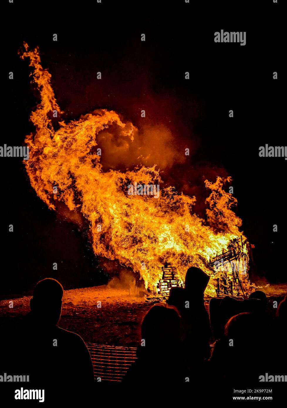 Teignmouth, UK. 29th Oct, 2022. An effigy of the Hogwarts Express burns ...