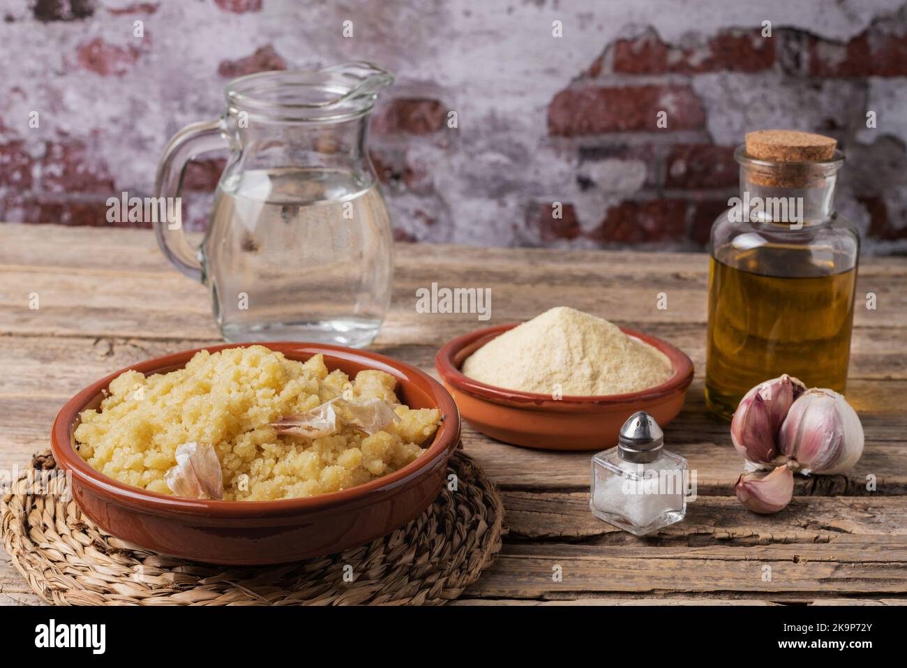 Rustic dish with crumbs, traditional Spanish food, along with the ...