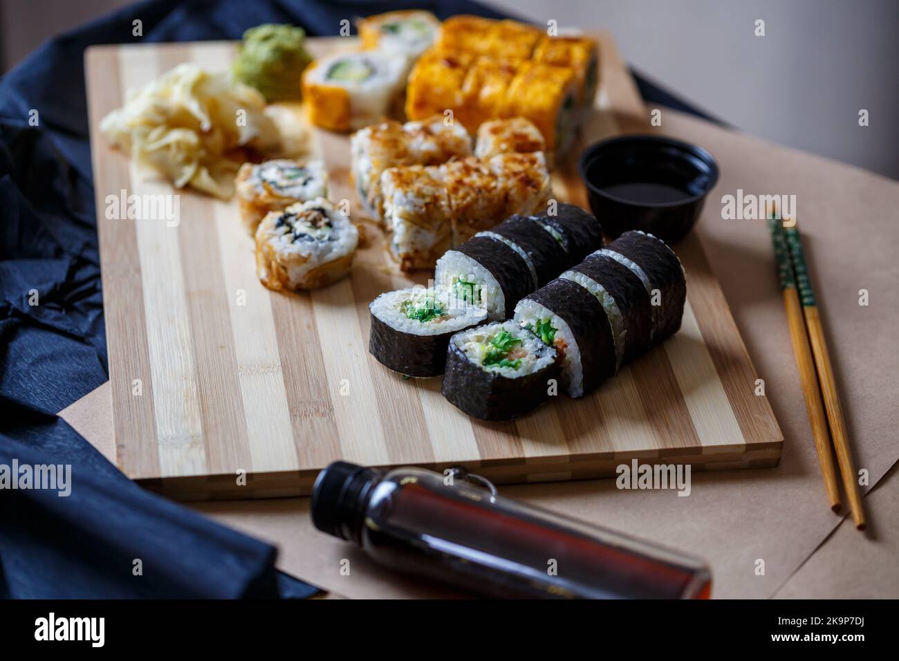 Sushi set with different types of rolls and sashimi made from eel ...